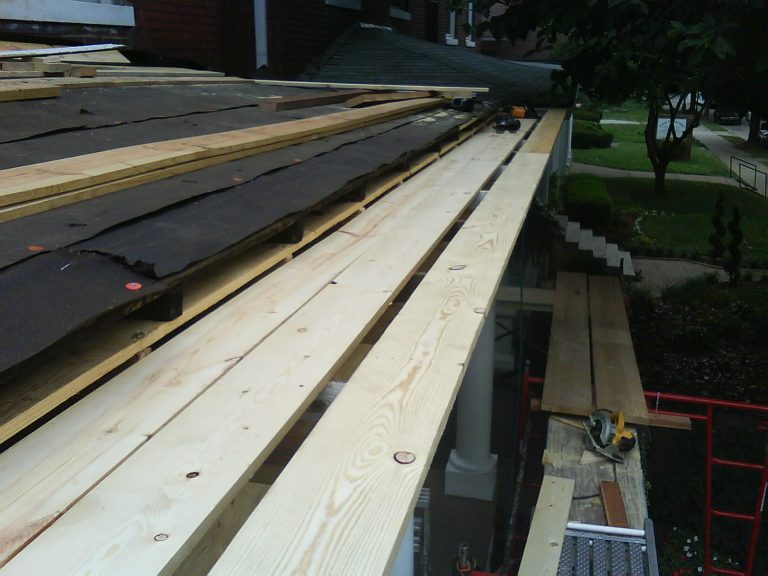 Cornice work: porch restoration, built-in gutters, and architectural ...